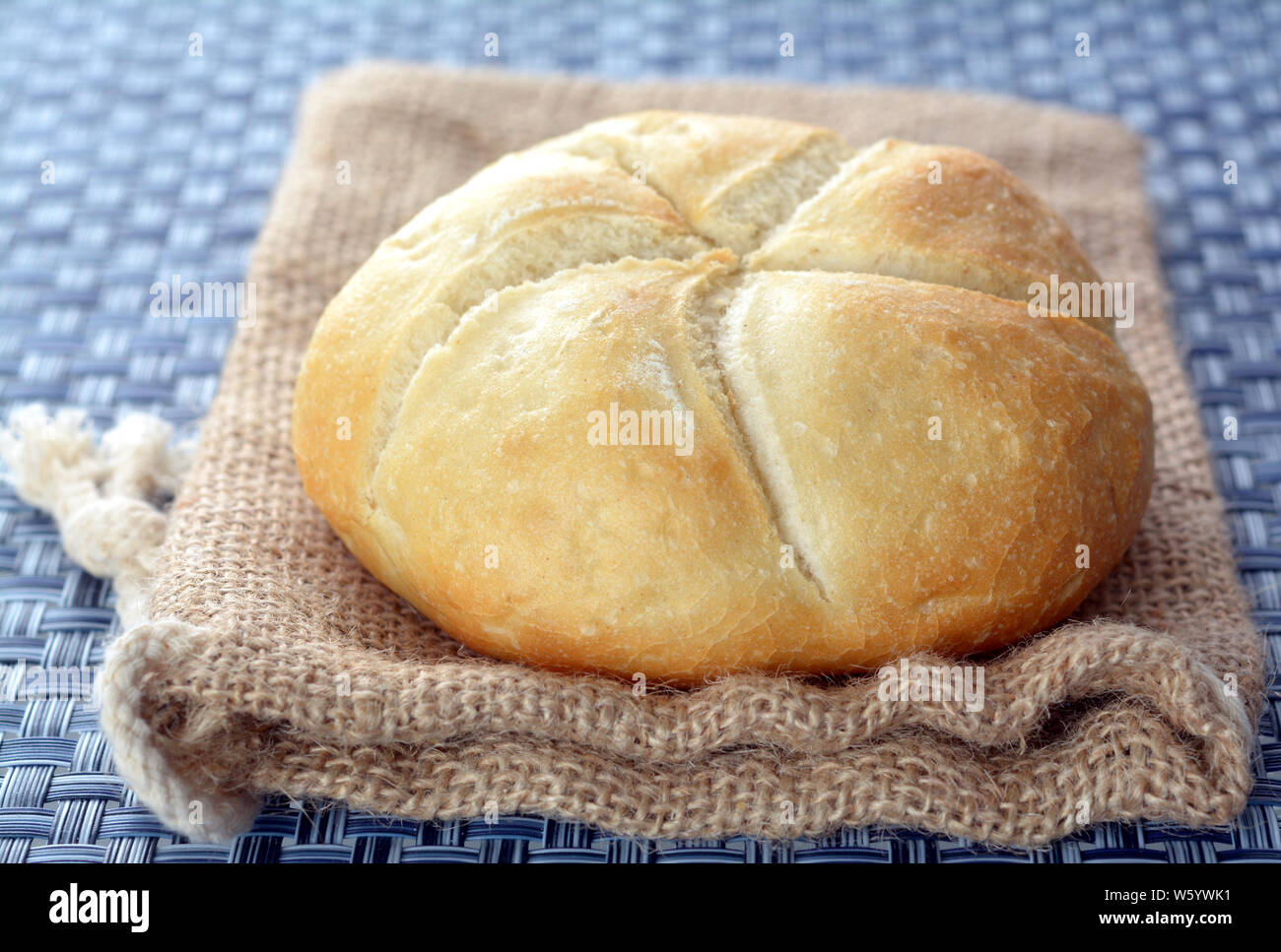 single kaiser bread on the table for breakfast Stock Photo - Alamy