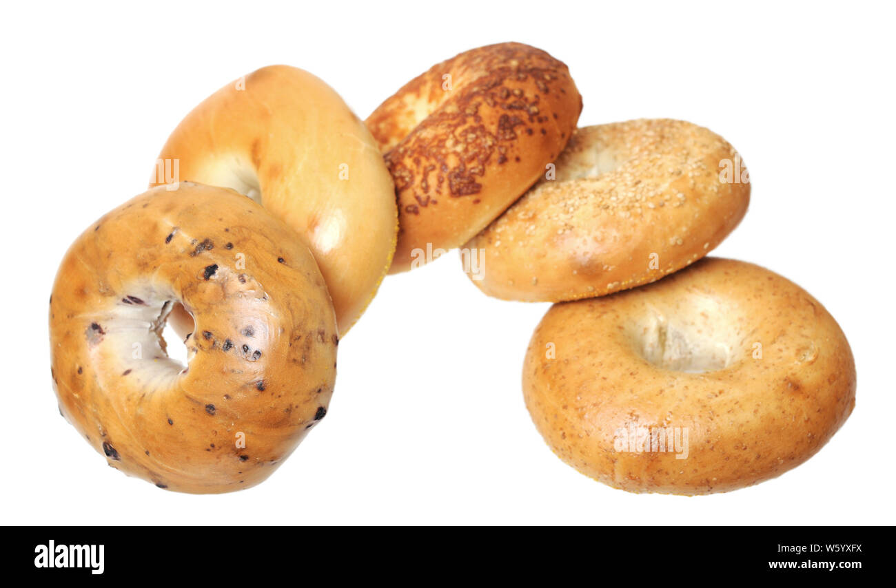 five baked bagels isolated on white background Stock Photo - Alamy