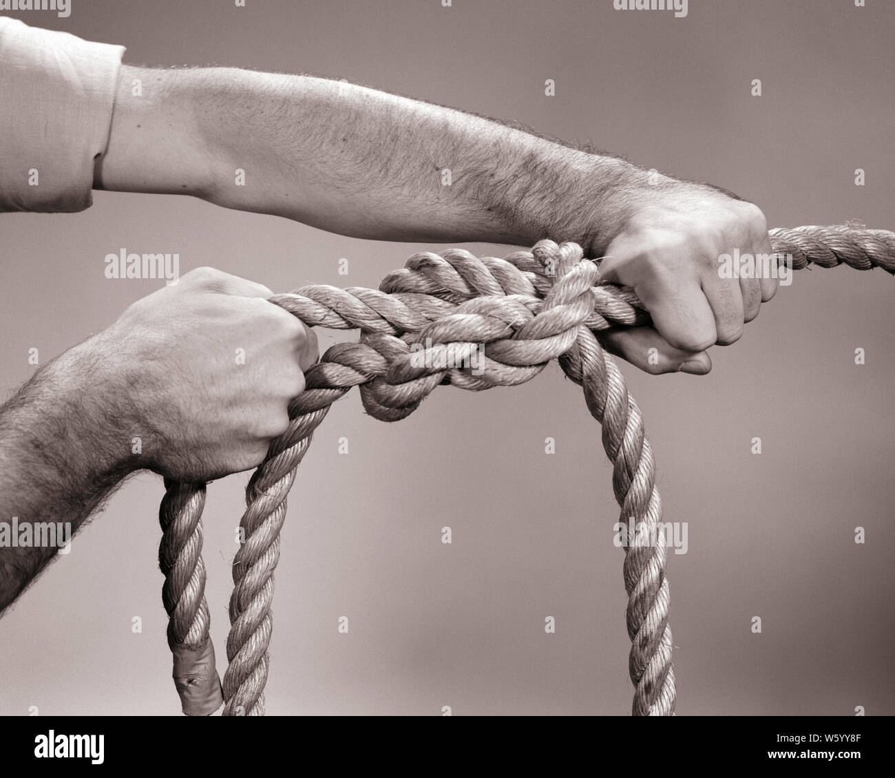 1960s MALE HANDS TYING SQUARE KNOT IN TWO ROPE LINES - s13713 HAR001 ...