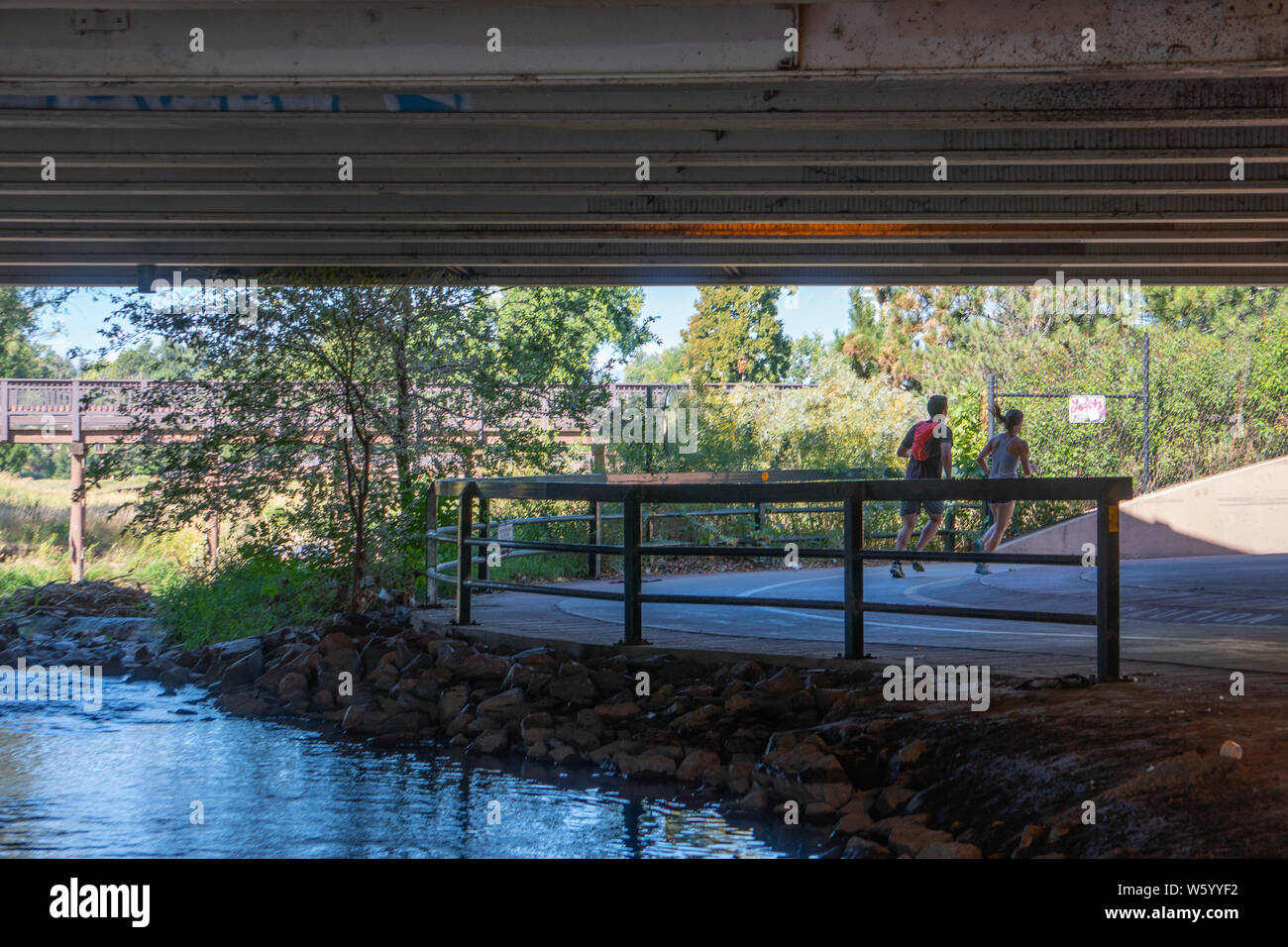 Running under bridge hi-res stock photography and images - Alamy