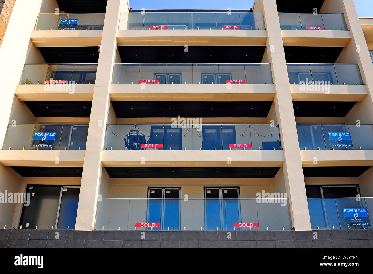 New apartment block with apartments showing both sold and for sale ...