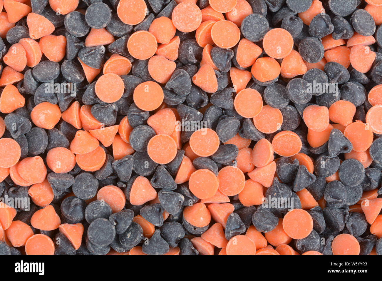 pile of colorful chocolate chip for cookie baking Stock Photo - Alamy