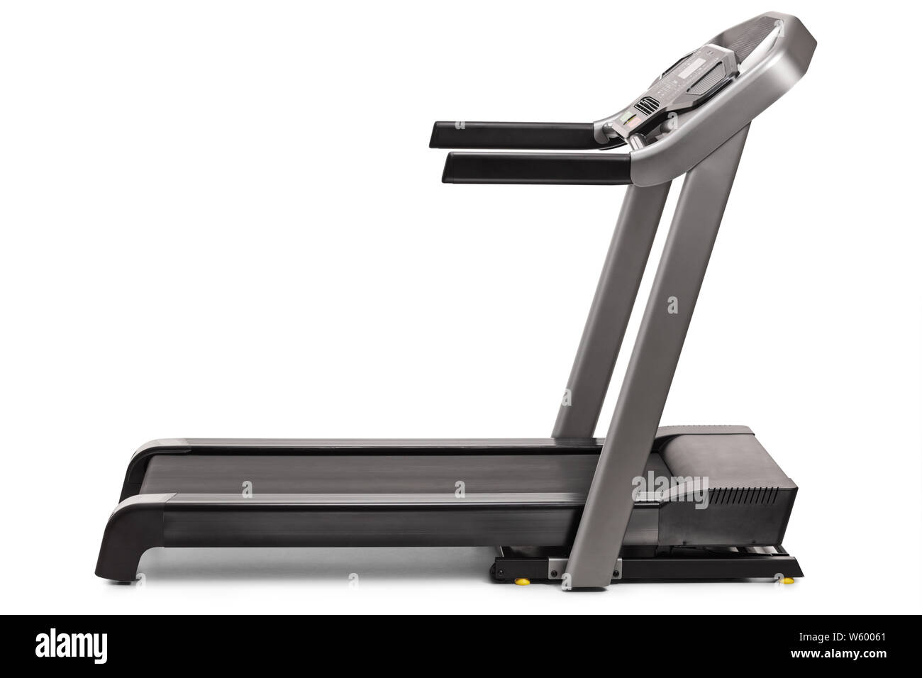 Studio shot of a professional treadmill isolated on white background ...