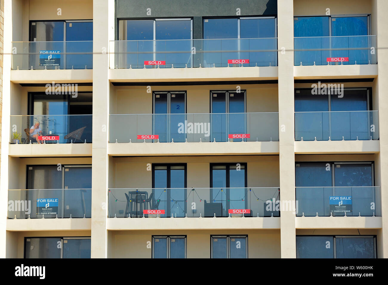 New apartment block with apartments showing both sold and for sale ...