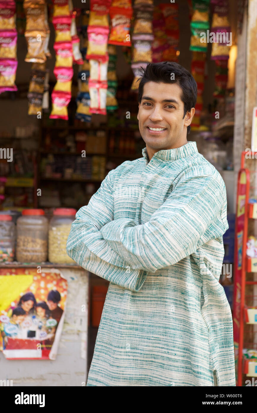 Indian shopkeeper smiling hi-res stock photography and images - Alamy