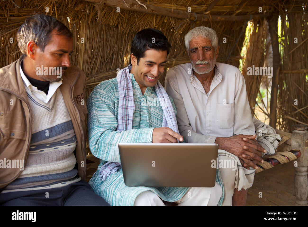 Indian man with laptop hi-res stock photography and images - Alamy