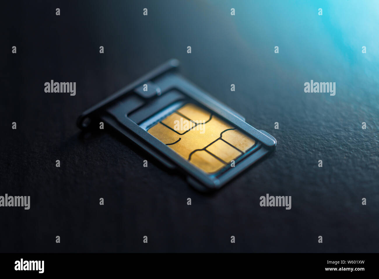 Sim card in tray close up Stock Photo - Alamy