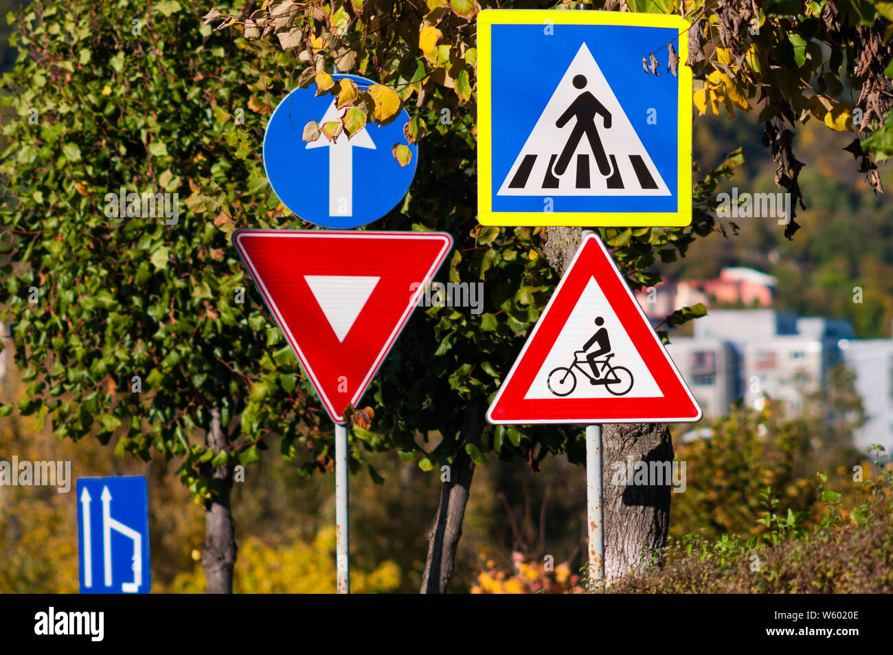 Multiple roadsigns, complicated road Stock Photo - Alamy