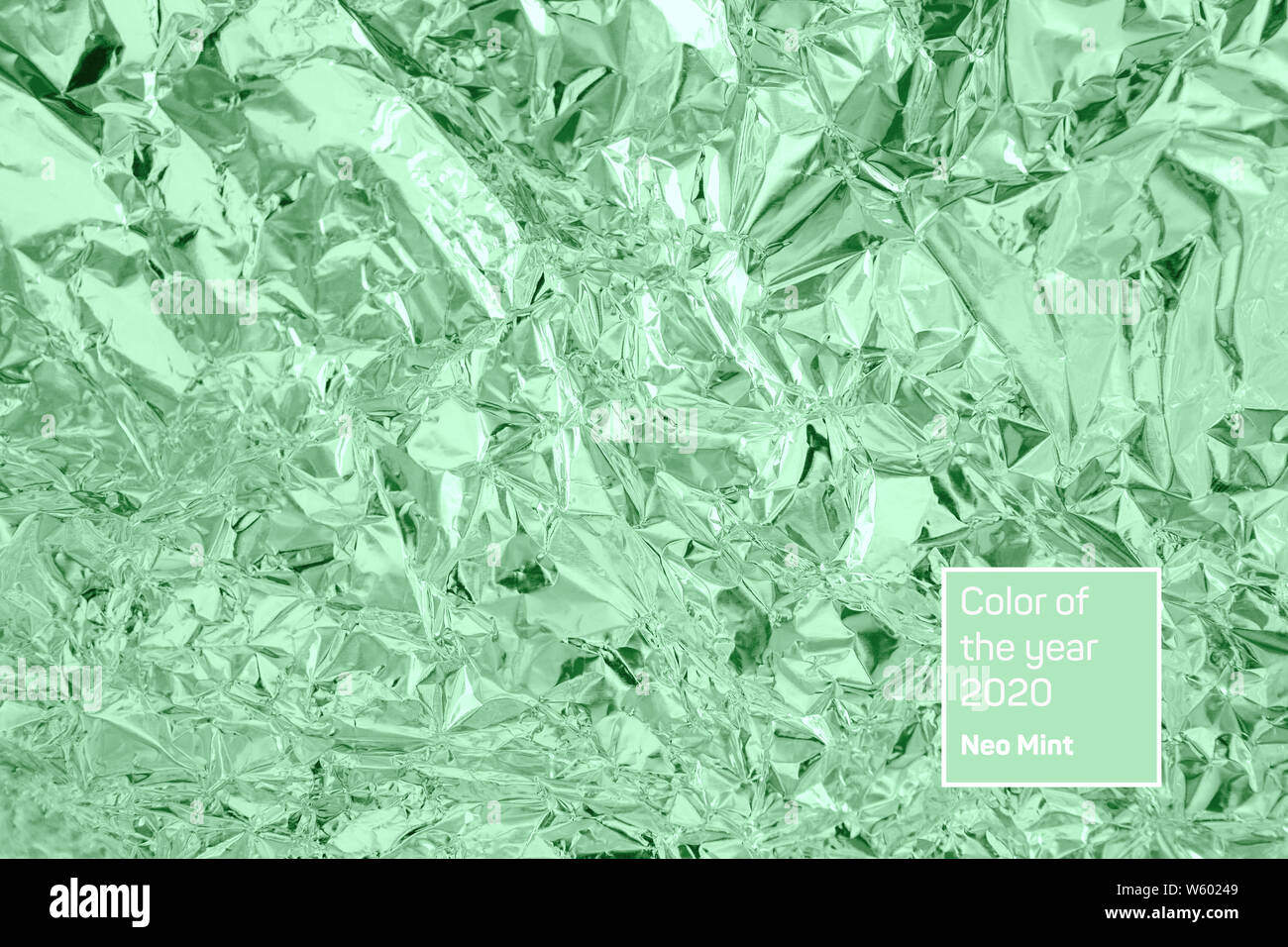 Abstract trendy mint colored crumpled foil texture background. Color ...