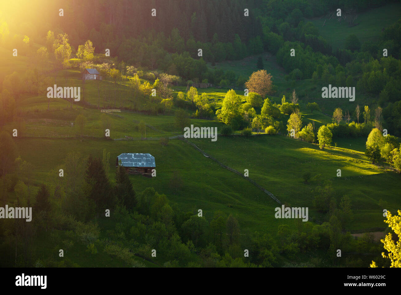 Beautiful spring landscape garden hillside house Stock Photo - Alamy