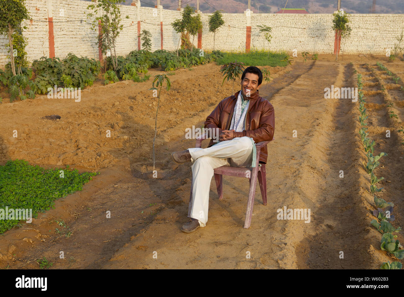 Farmer sitting in chair hi-res stock photography and images - Alamy