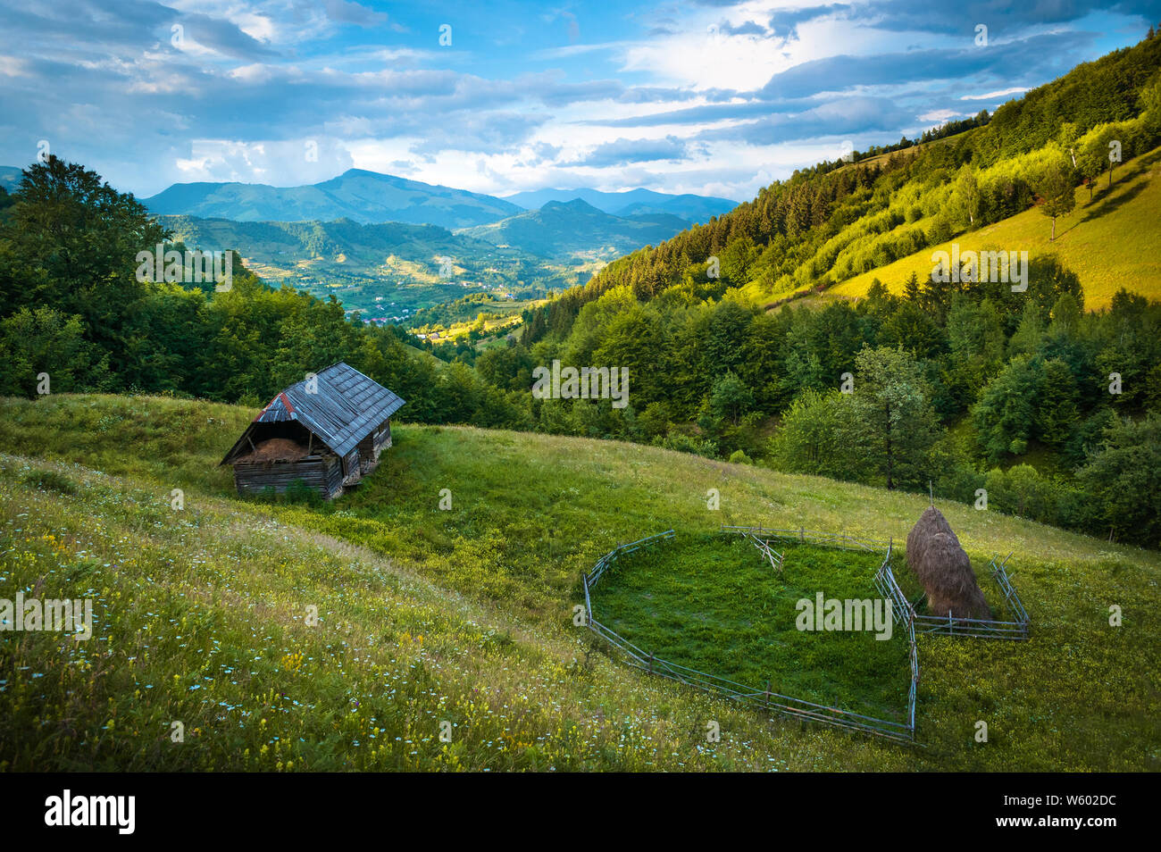 Beautiful little farm barn in rural landscape area Stock Photo - Alamy