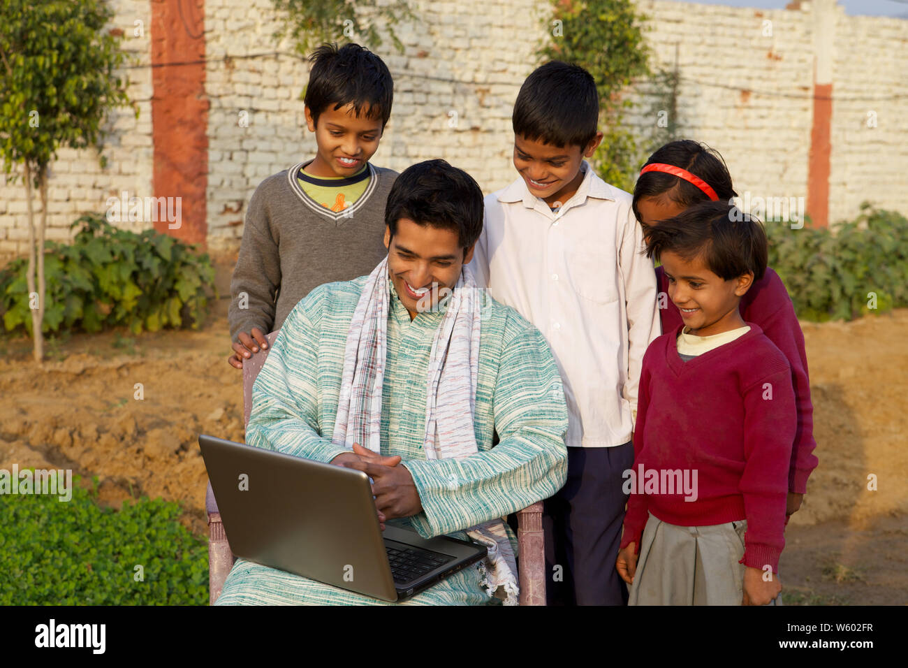 Indian teacher talking to students hi-res stock photography and images ...