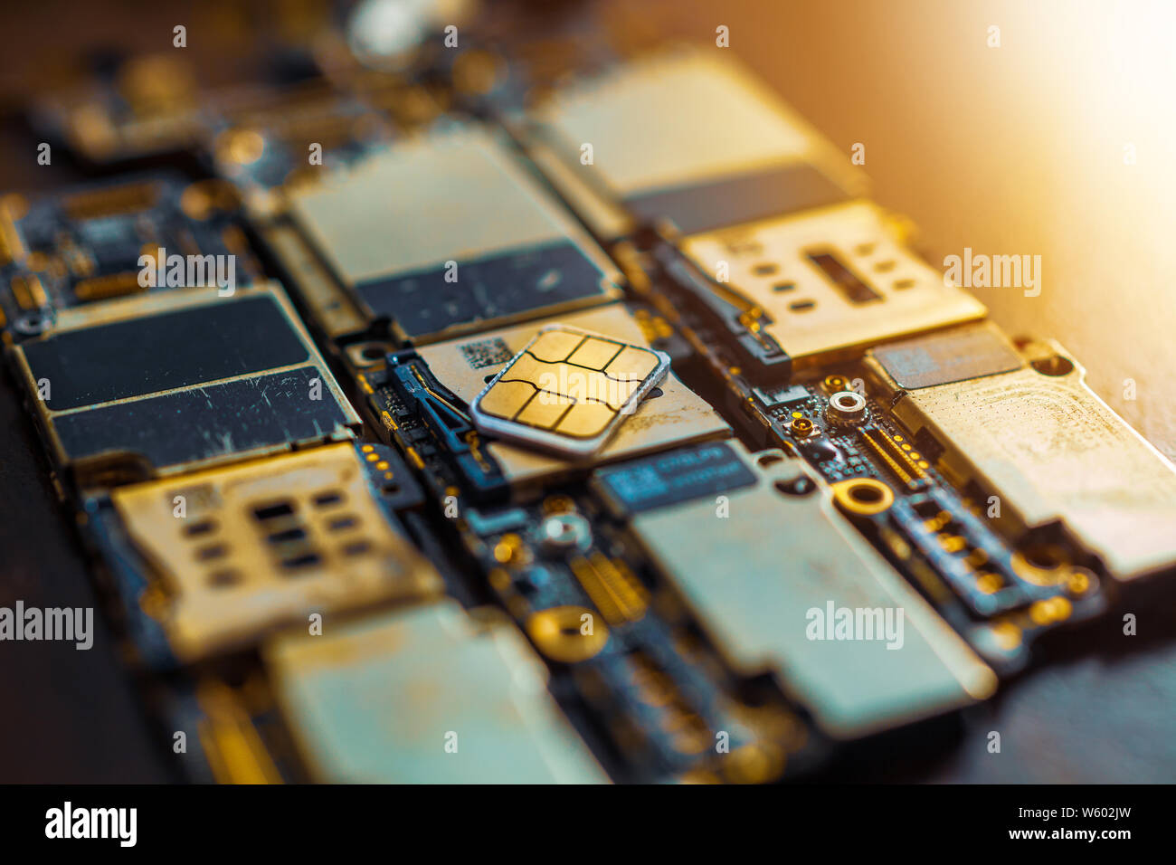 Sim card on mobile phone motherboards Stock Photo - Alamy