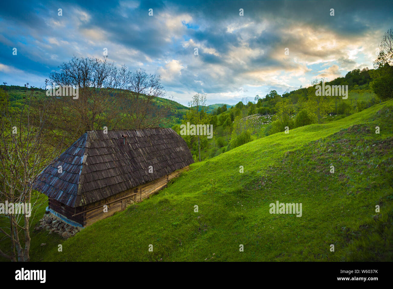 Beautiful little farm barn in rural landscape area Stock Photo - Alamy