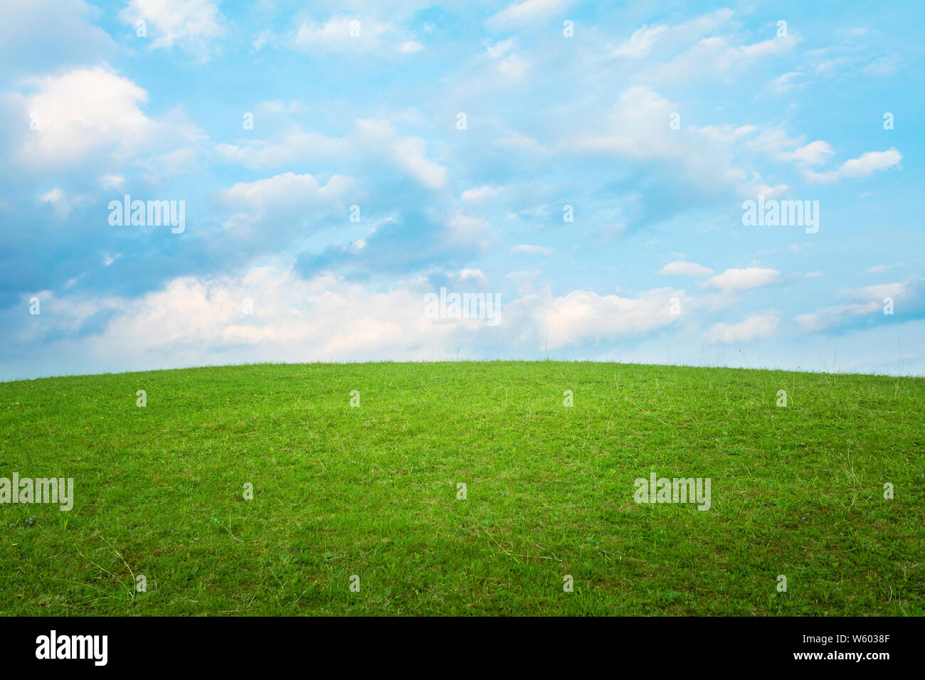 Beautiful simple hill landscape with clouds background Stock Photo - Alamy