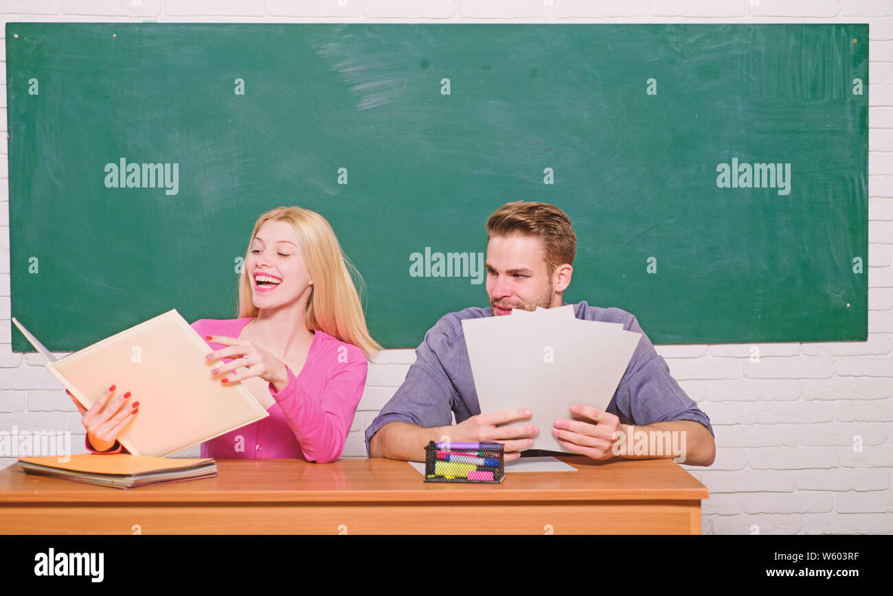 Back to school. Couple of man and woman in classroom. Home schooling ...