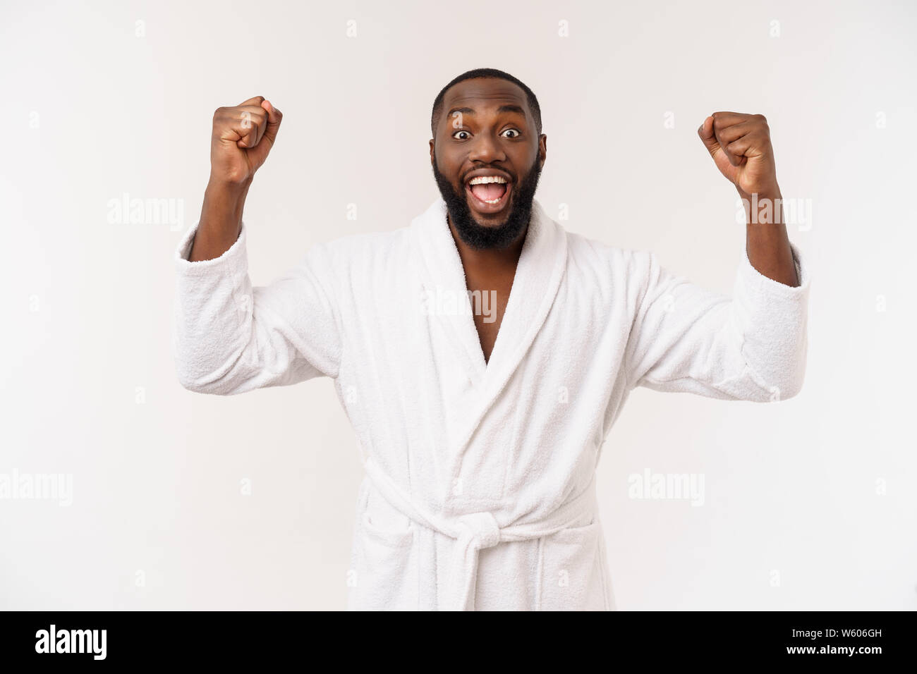 Portrait of excited young African American male screaming in shock and ...