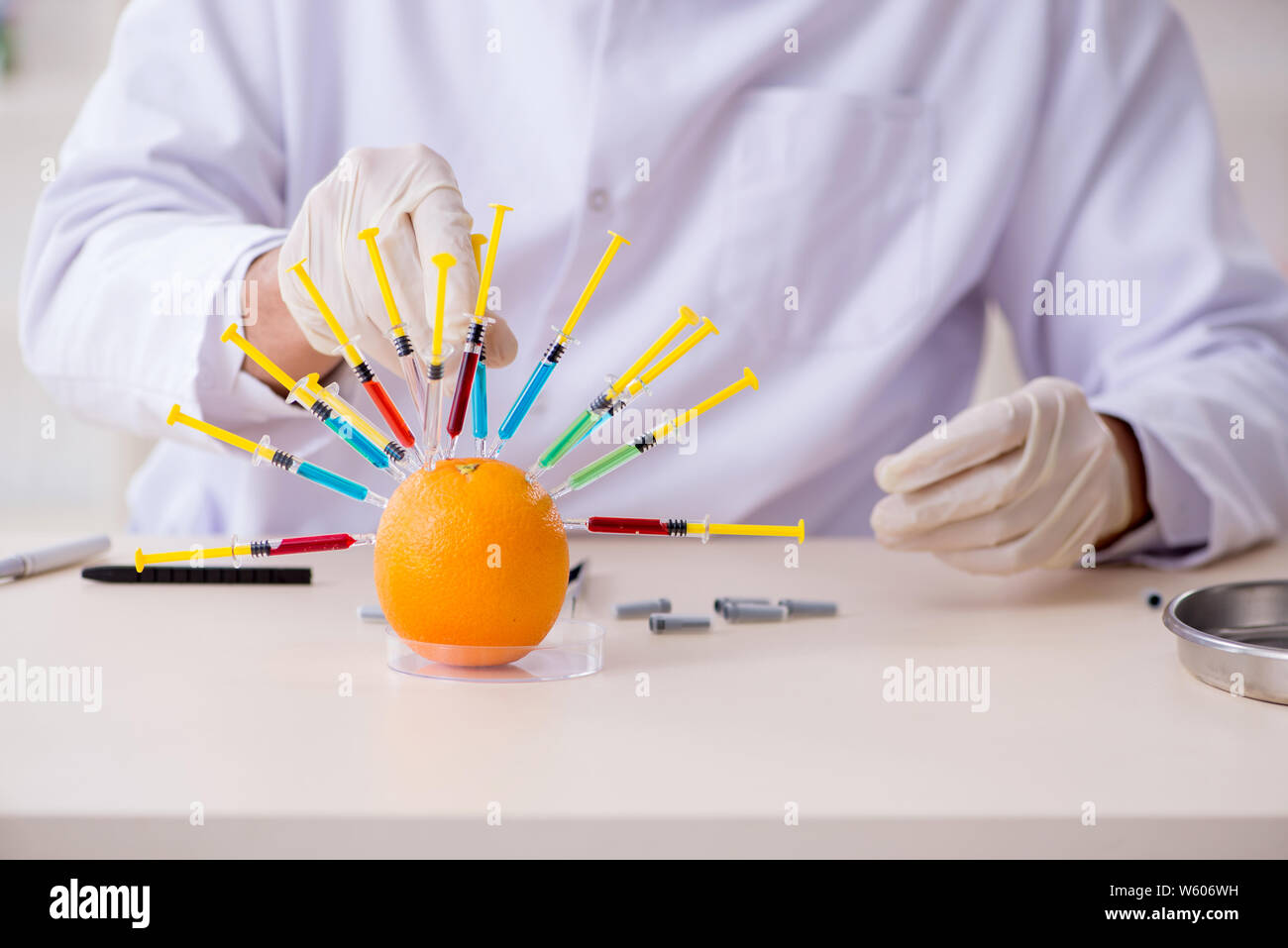 The male nutrition expert testing food products in lab Stock Photo - Alamy