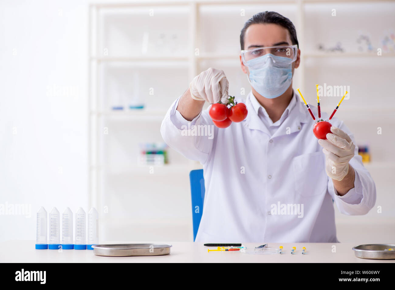 The male nutrition expert testing food products in lab Stock Photo - Alamy