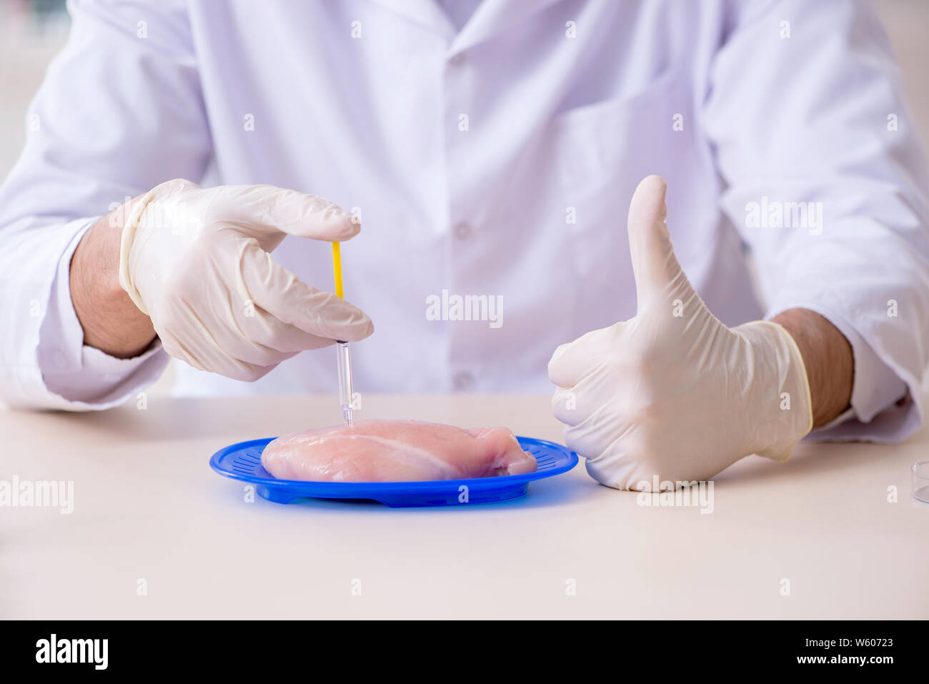 The male nutrition expert testing food products in lab Stock Photo - Alamy