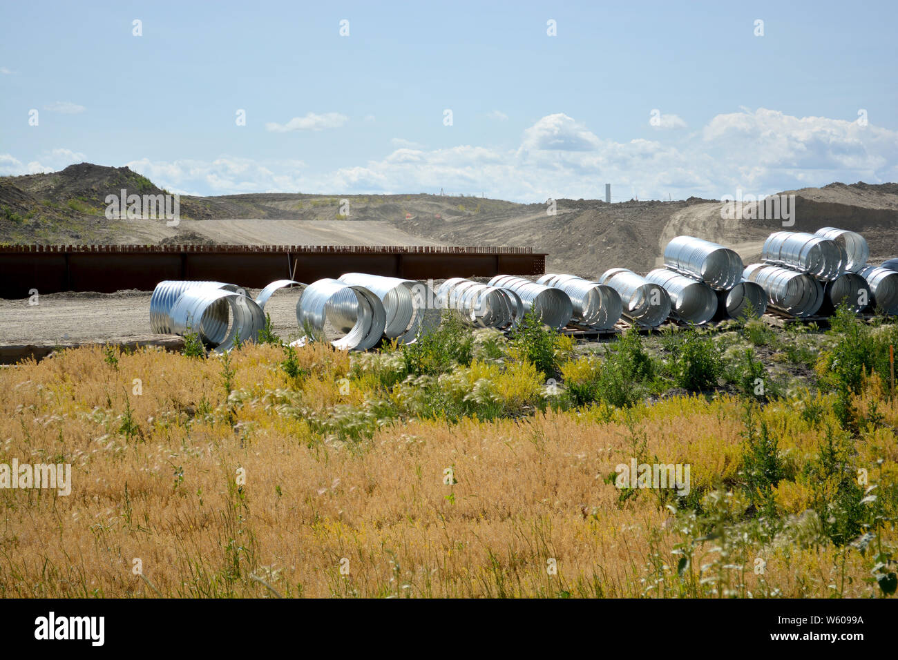 Galvanized metal culvert pipe on construction site Stock Photo - Alamy