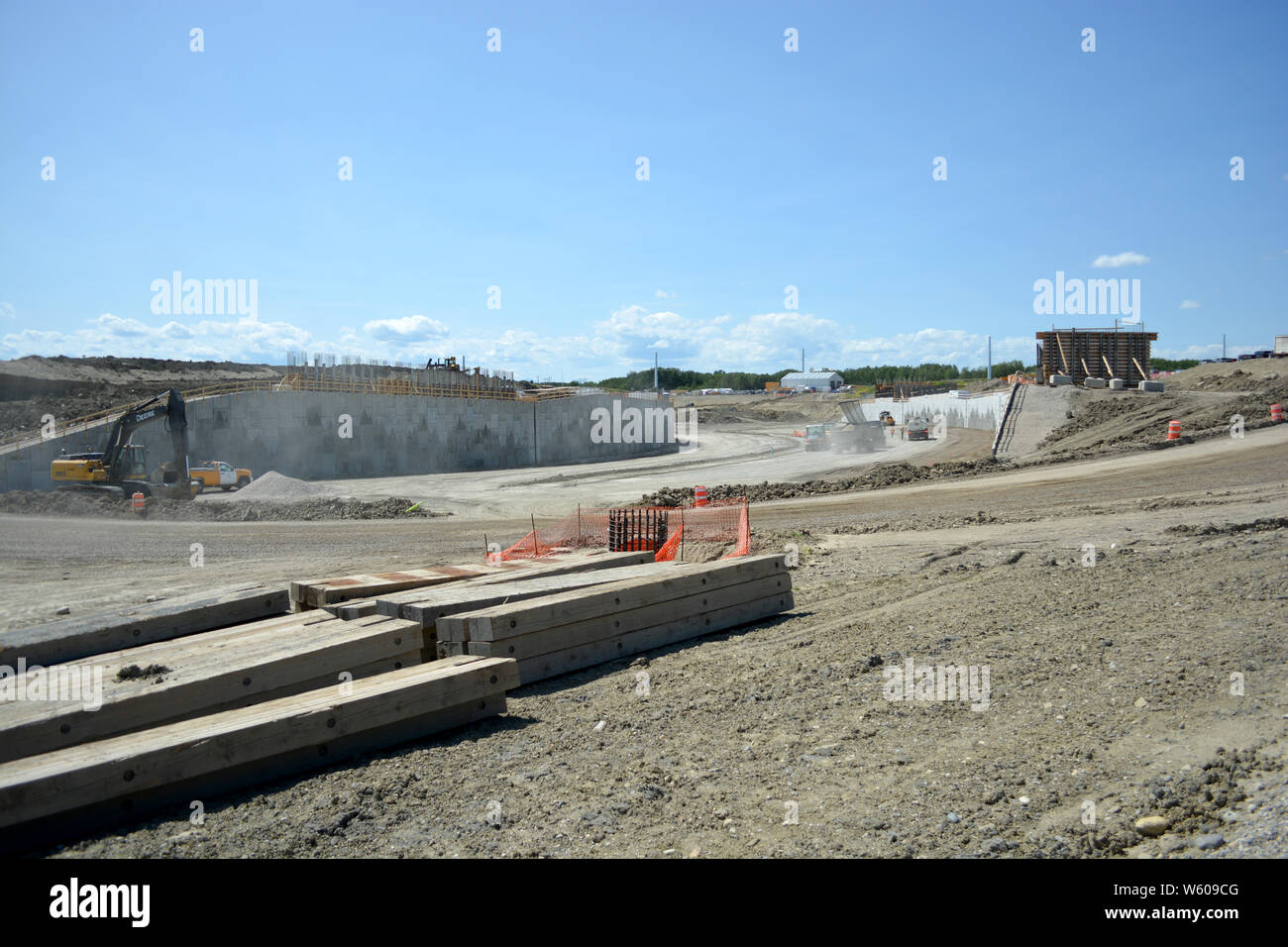Highway construction site with concrete and steel reinforcement and ...