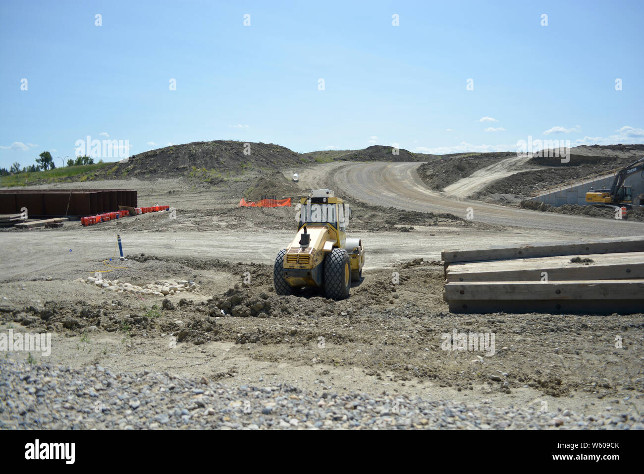 Highway construction site with concrete and steel reinforcement and ...