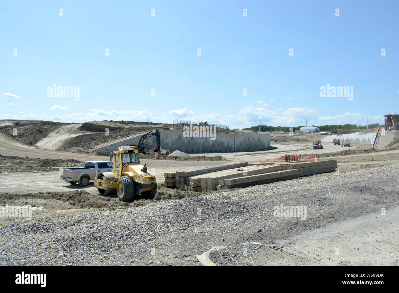 Highway construction site with concrete and steel reinforcement and ...