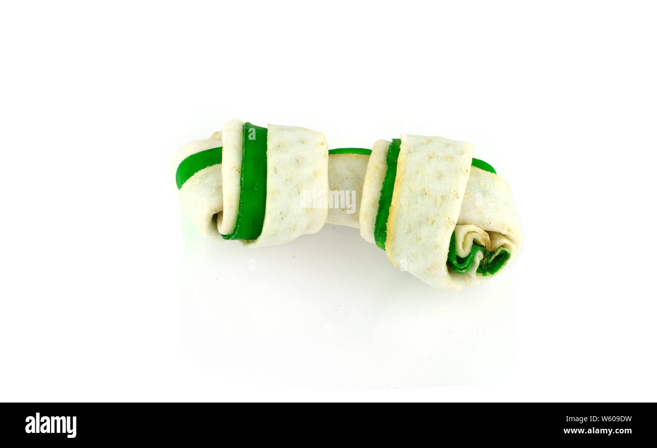 Dental treats dog green bone sticks shape. Isolated on white background ...