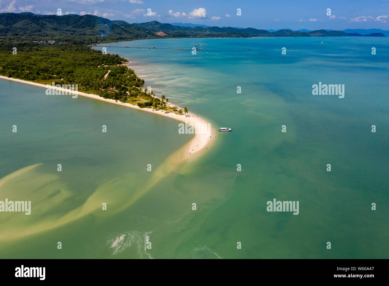 Aerial drone view of a beautiful sandy beach and tropical ocean (Laem ...