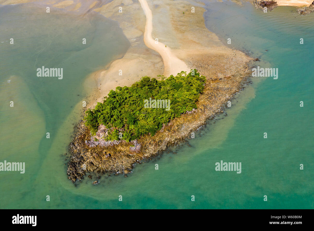 Aerial view of a small offshore island connected by a small, winding ...