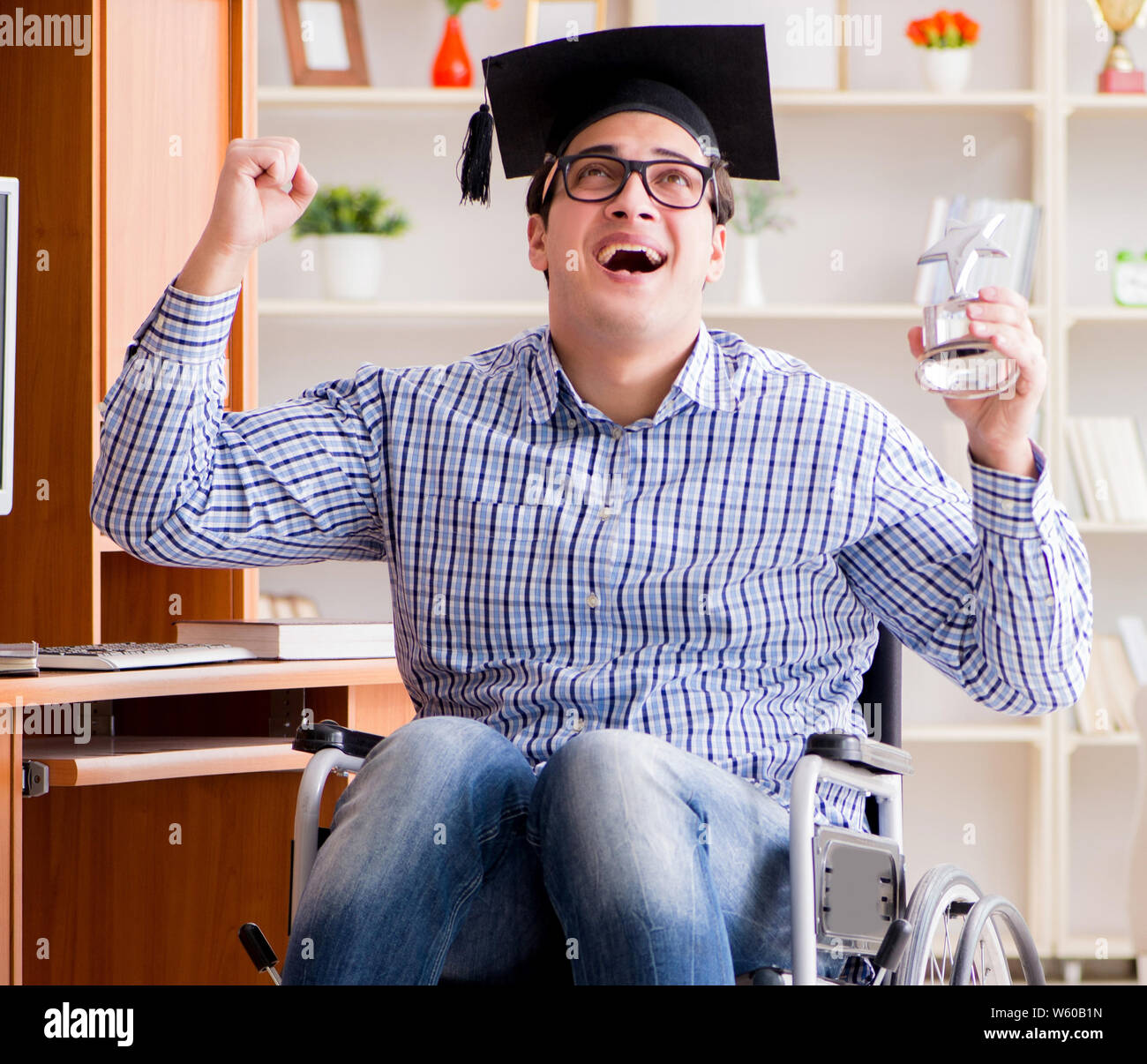 The disabled student studying at home on wheelchair Stock Photo - Alamy