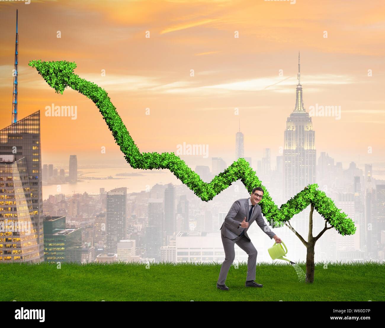 The businessman in investment concept watering financial line chart ...