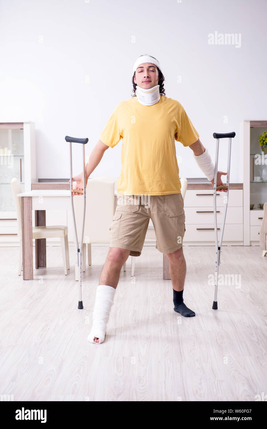 The young man after accident recovering at home Stock Photo - Alamy