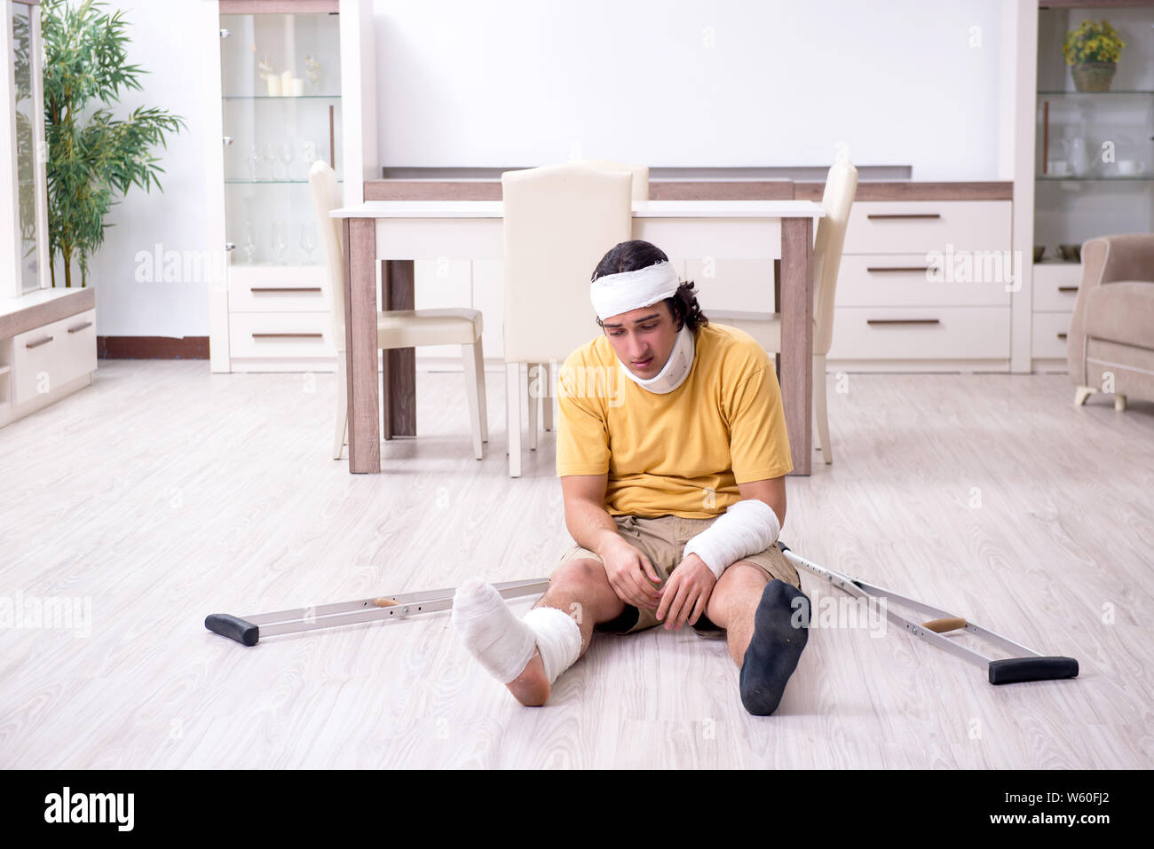 The young man after accident recovering at home Stock Photo - Alamy