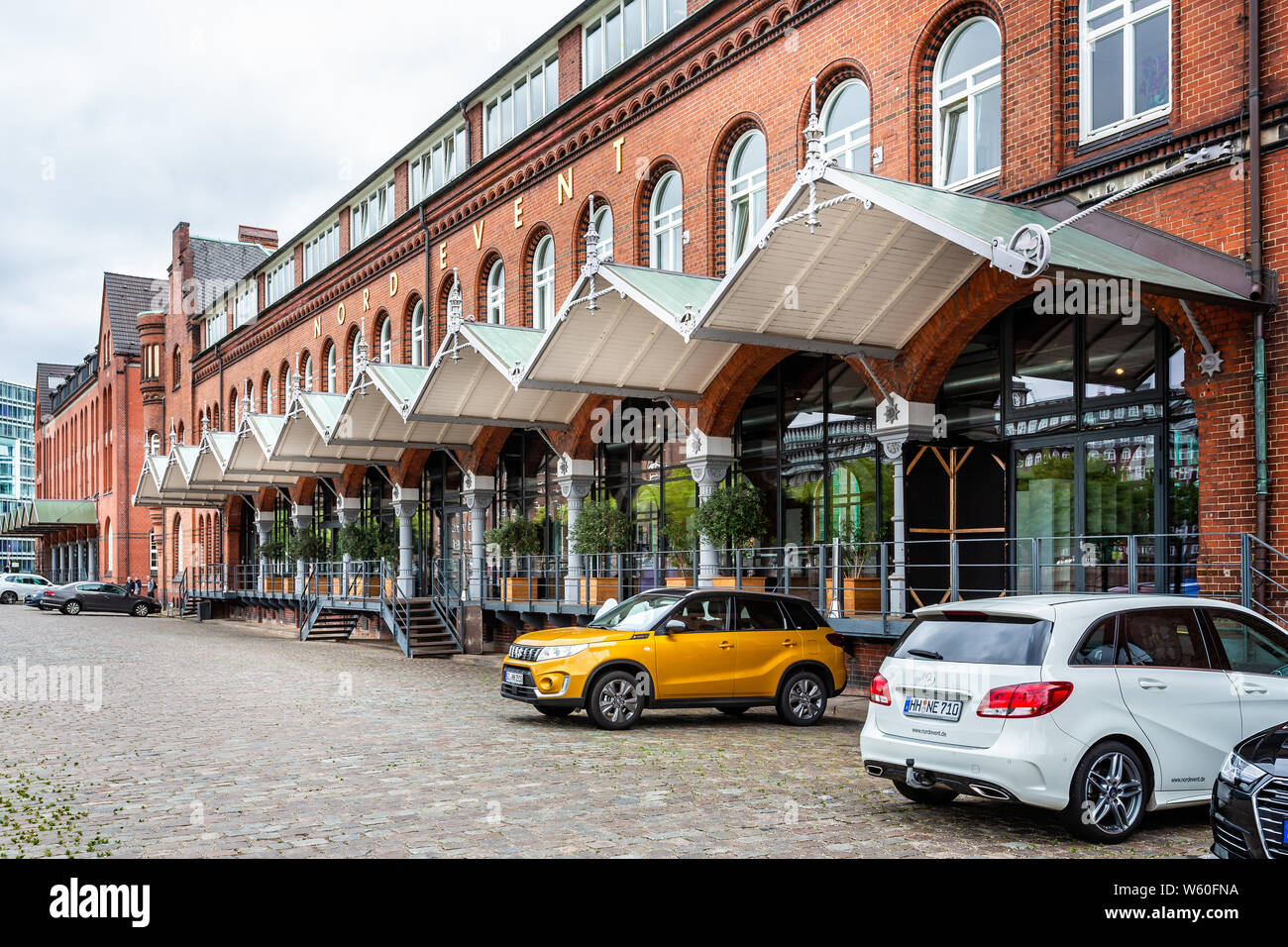 Nord Event offices in converted red brick warehouse on river side in ...