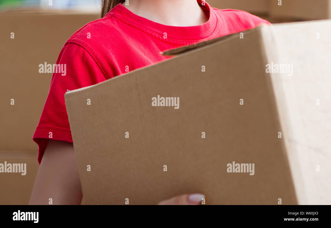 The young woman delivering boxes of personal effects Stock Photo - Alamy