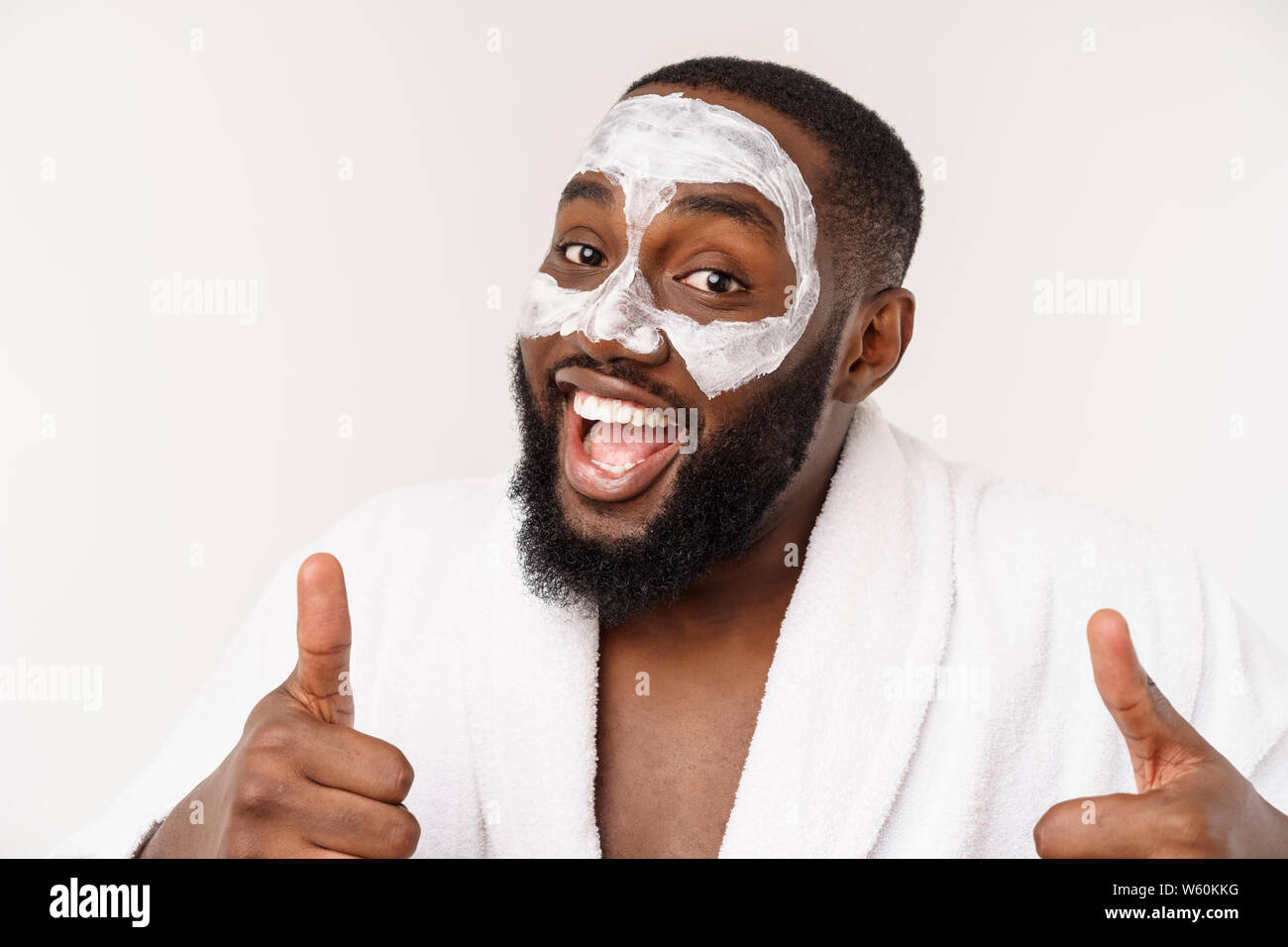 funny laughing man with mask leads healthy lifestyle, showing thumb up ...