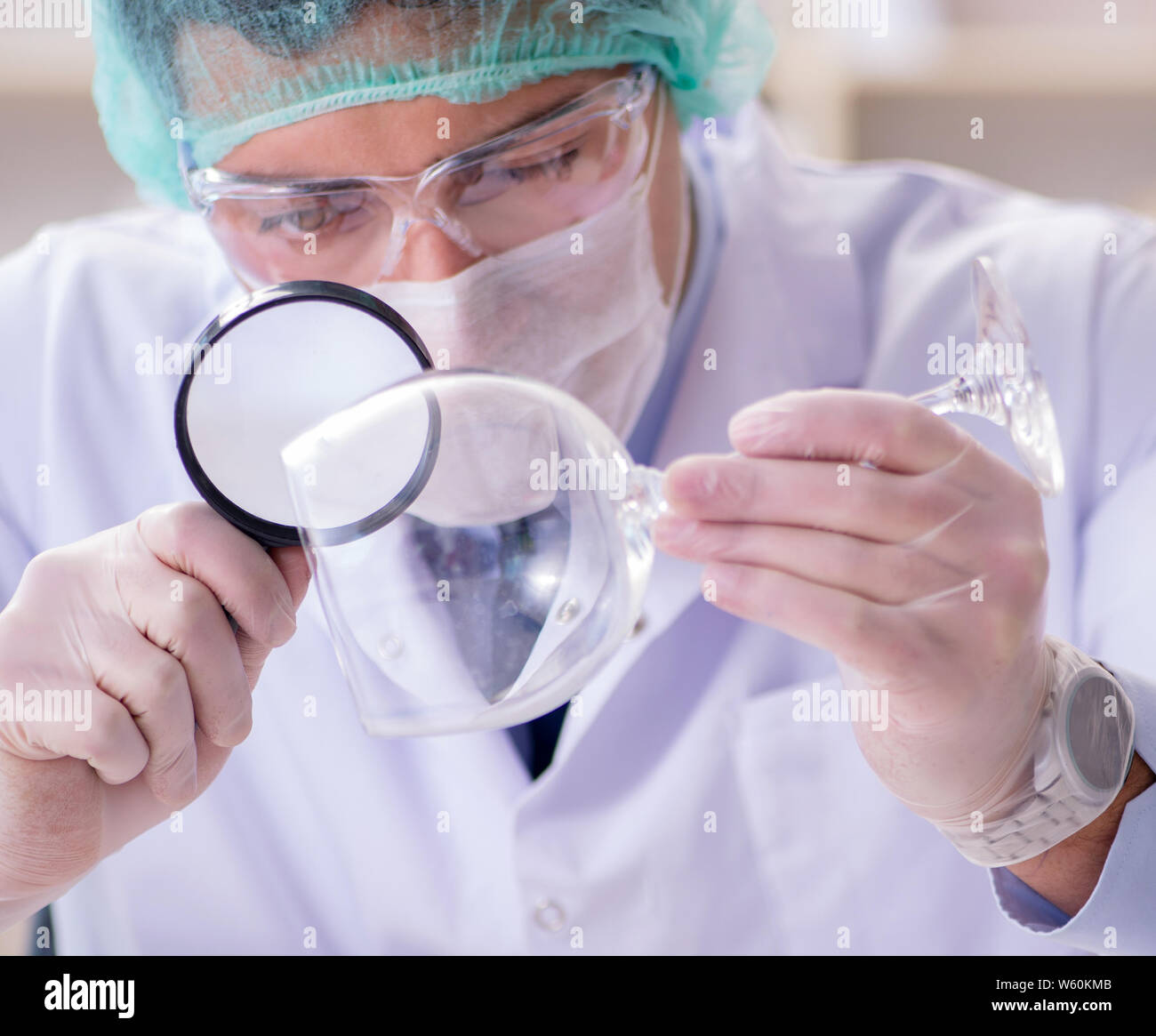 The forensics investigator working in lab on crime evidence Stock Photo ...