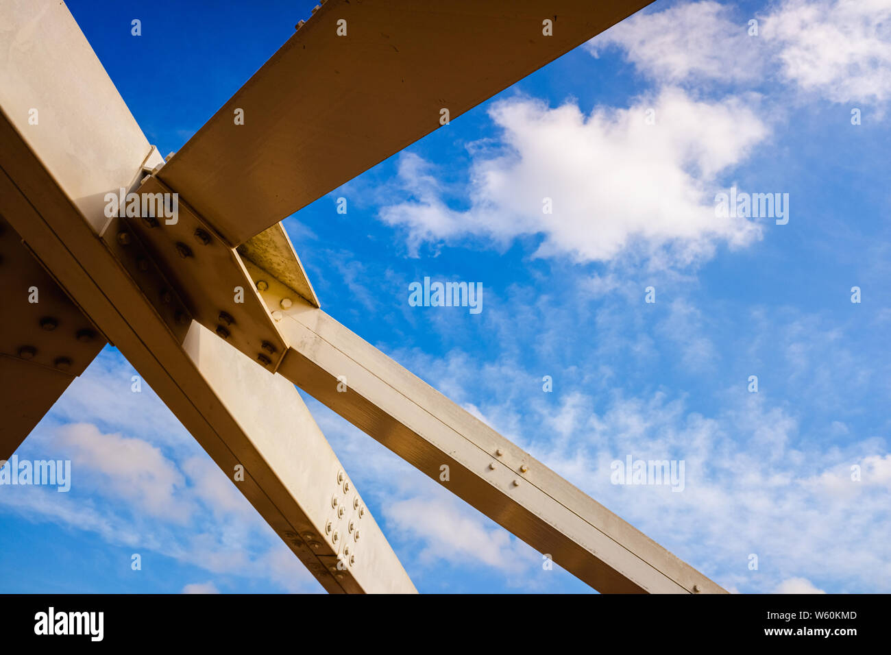 Reinforcement of the metal structure of a bridge, with white steel ...