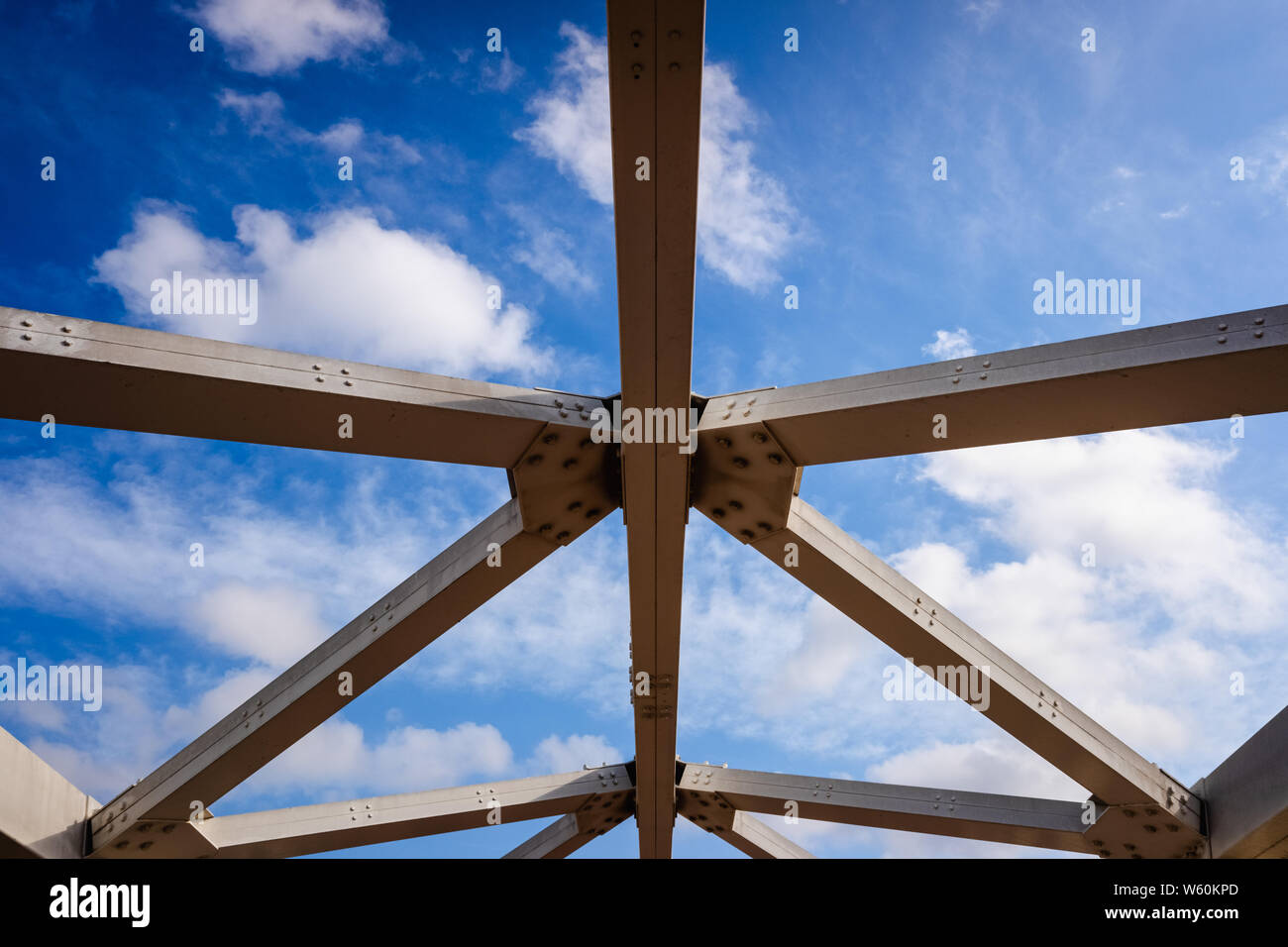 Reinforcement of the metal structure of a bridge, with white steel ...