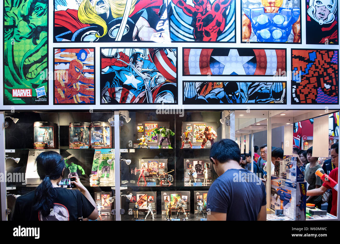Visitors and customers seen at Disney's Marvel Studio booth during the ...