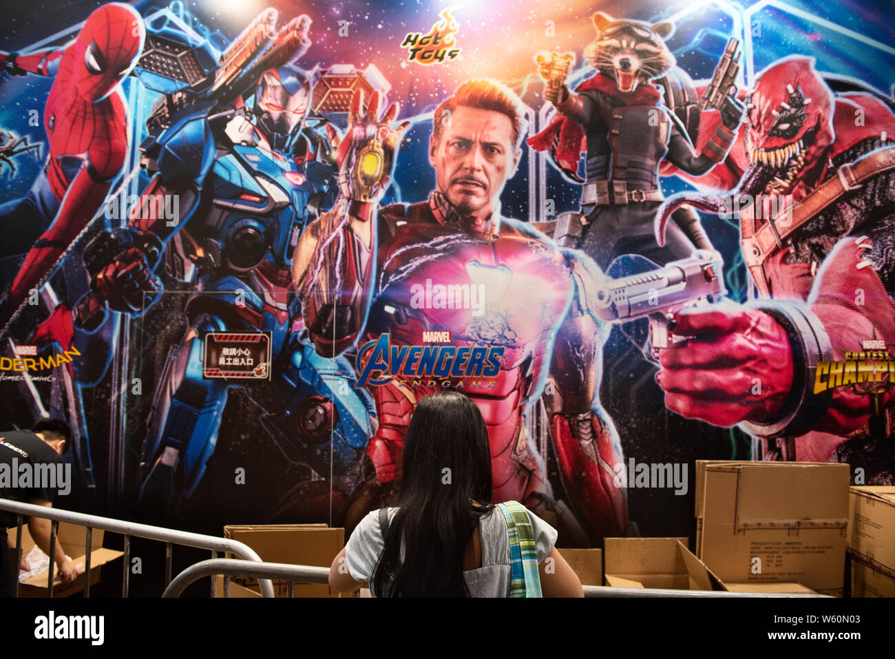 Visitors and customers are seen at booth during the Ani-Com & Games ...