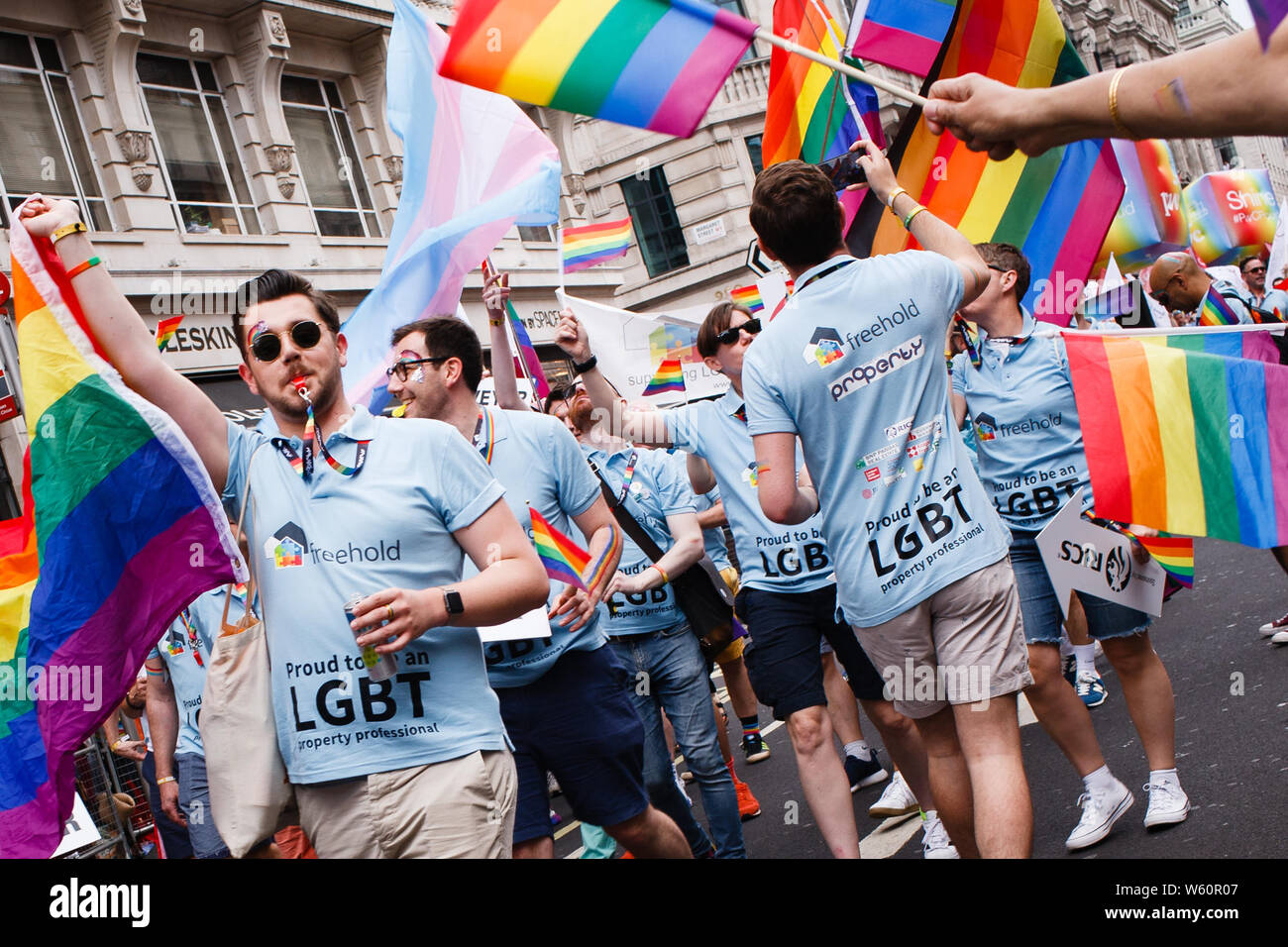 Gay pride parade flags supporters hi-res stock photography and images ...