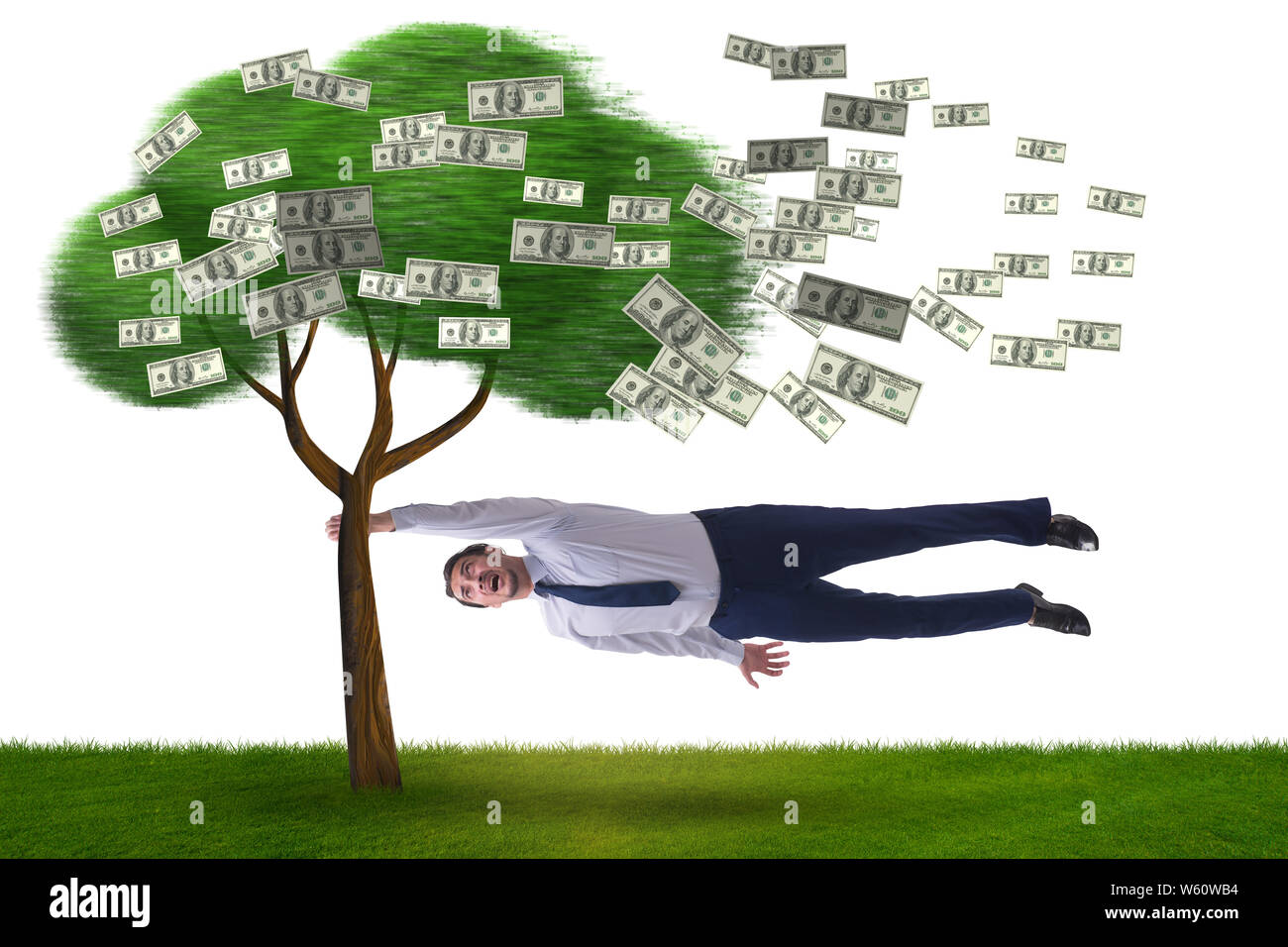 The businessman blown away from the money tree Stock Photo - Alamy