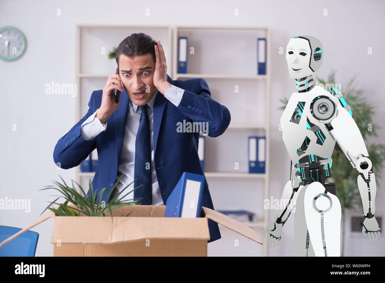 The concept of robots replacing humans in offices Stock Photo - Alamy