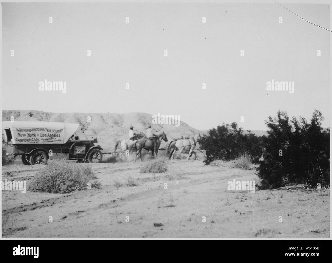 Automobile helped through sandy wash onto mesa, 7 miles northwest of ...