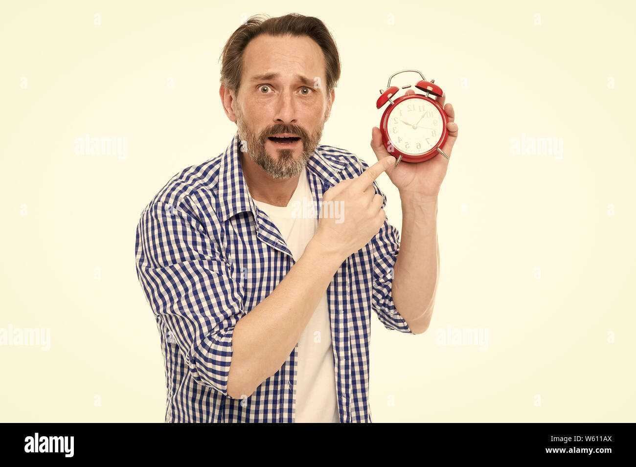 Man bearded mature guy hold alarm clock. Time management skill. Take ...
