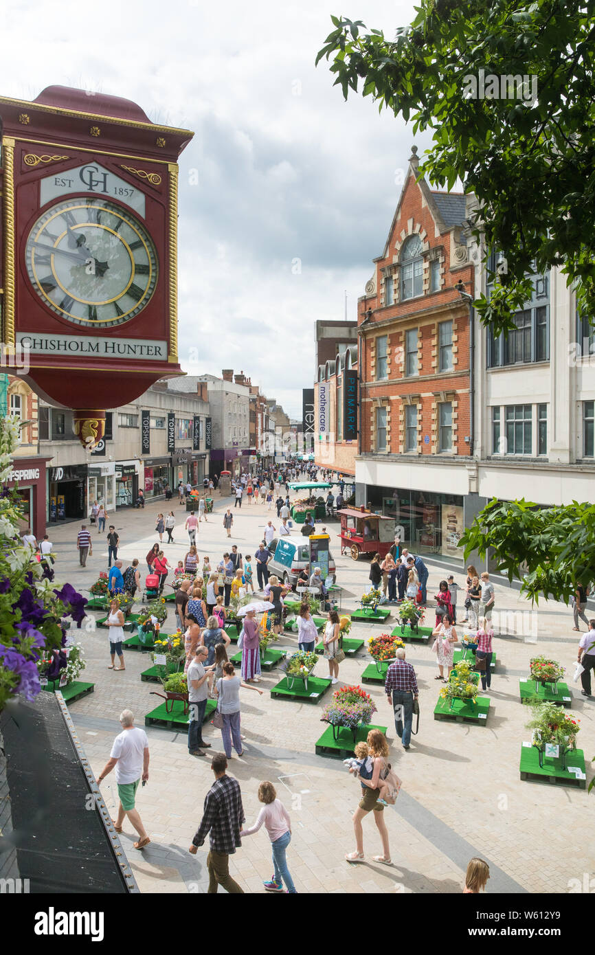 Market square wheelbarrows display Stock Photo - Alamy